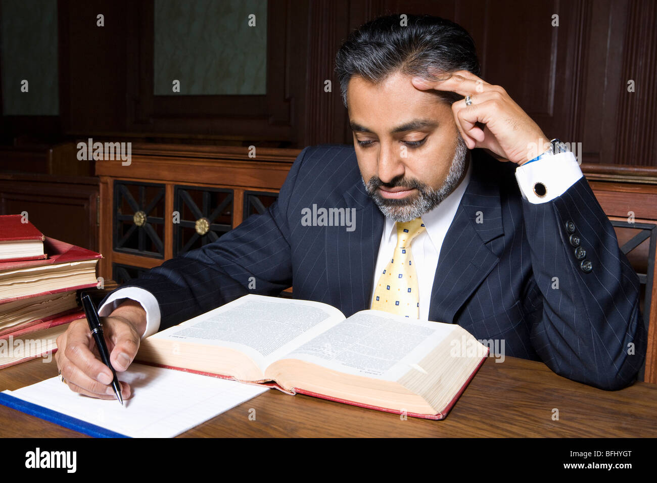 Man writing in court Stock Photo - Alamy