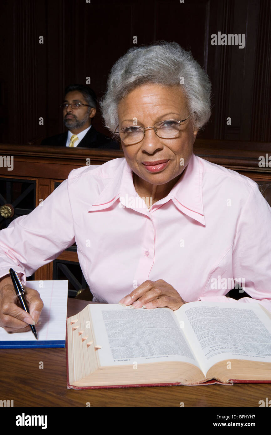 Female solicitor working in court, portrait Stock Photo - Alamy