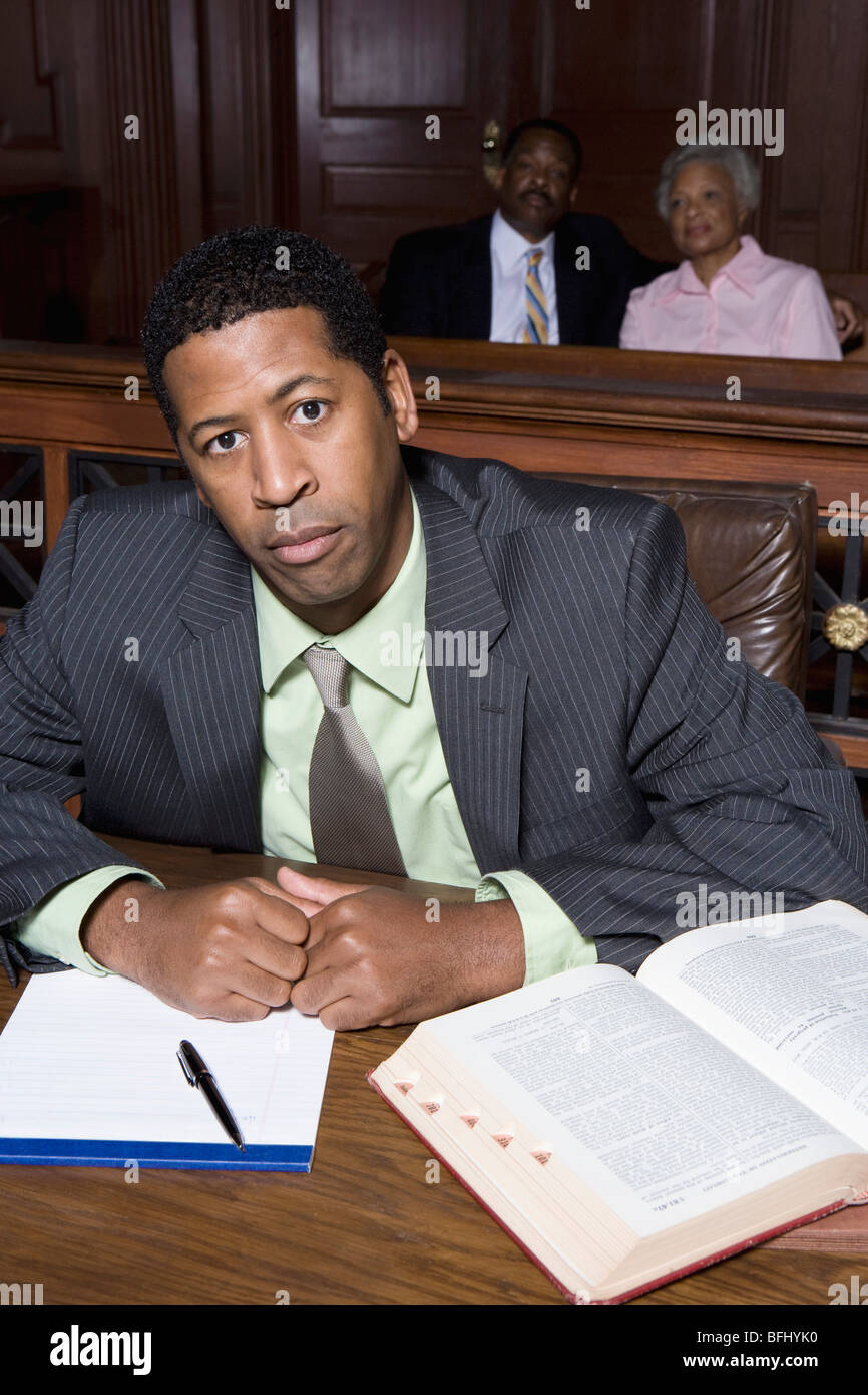 Man sitting in court Stock Photo - Alamy