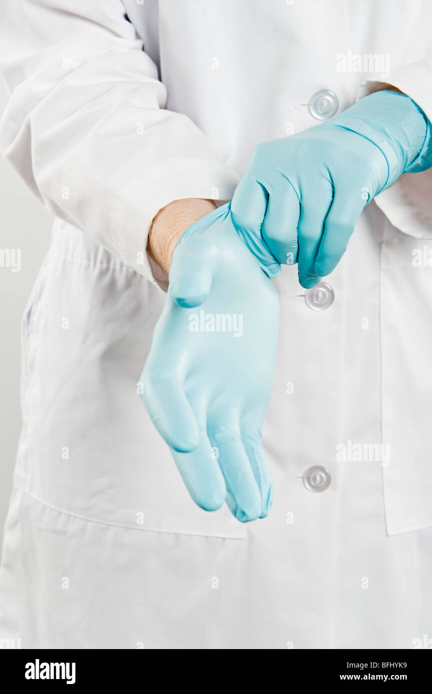 Doctor rubber gloves mid section hi res stock photography and images Alamy