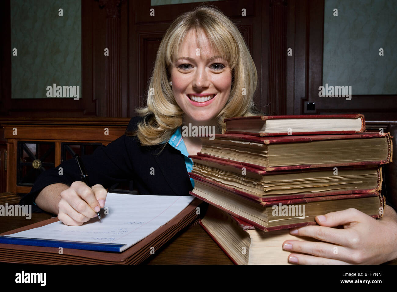 Woman working in court, portrait Stock Photo - Alamy