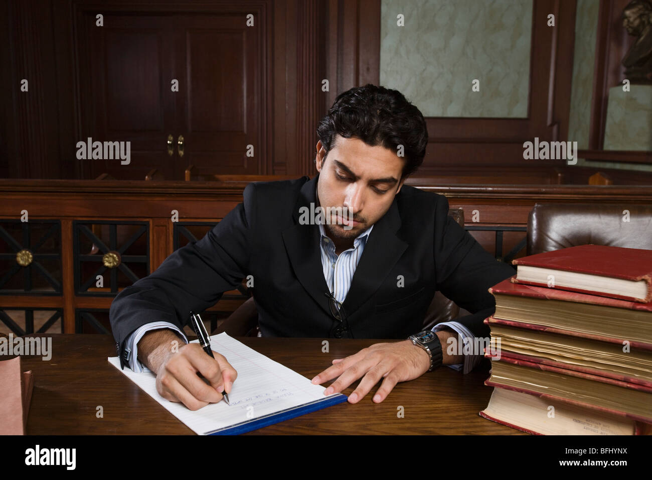 Man working in court Stock Photo - Alamy