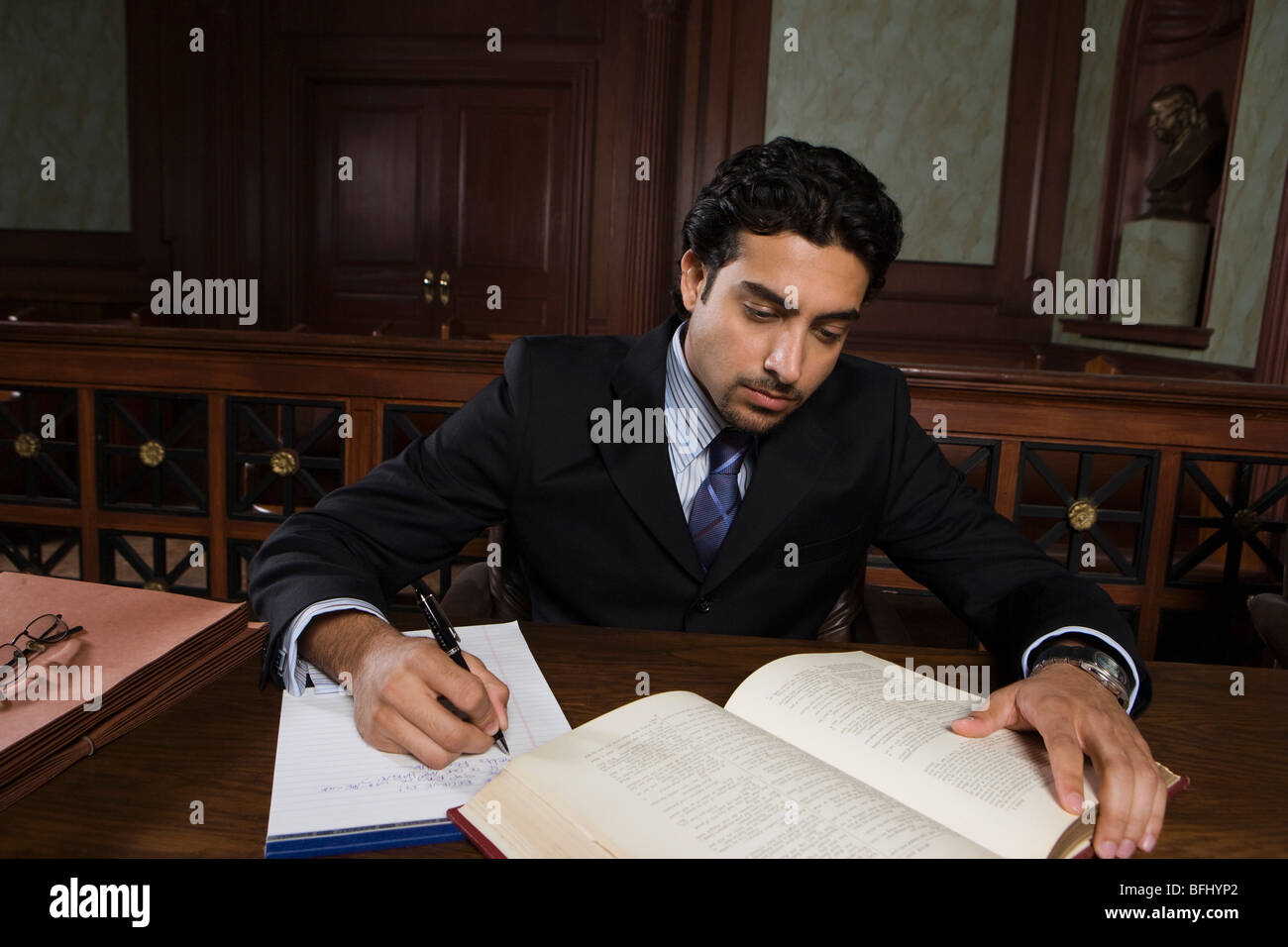 Man working in court Stock Photo - Alamy