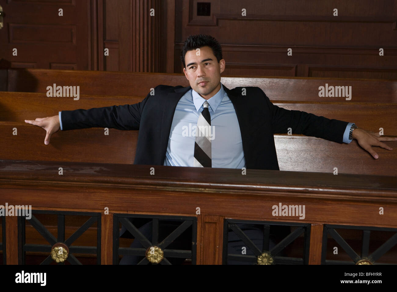 Man sitting in court Stock Photo - Alamy
