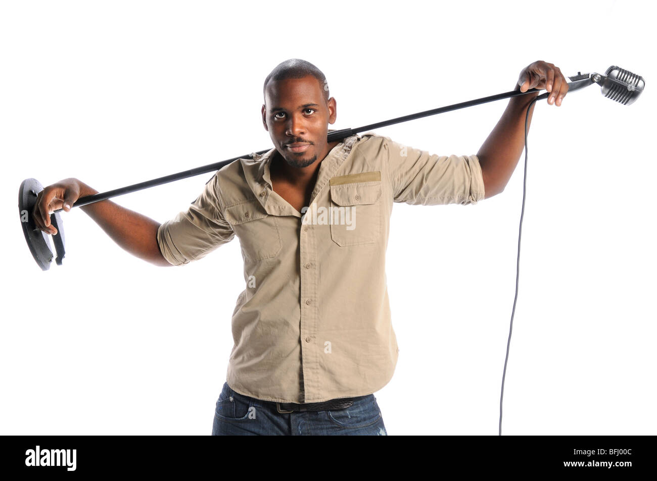 African American man with vintage microphone over shoulders Stock Photo ...