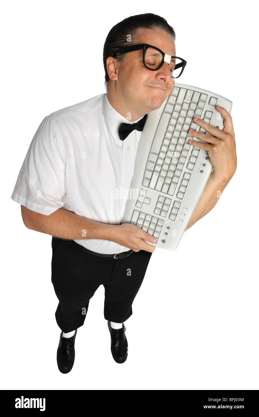 Nerd lovingly holding keyboard isolated over white background Stock ...