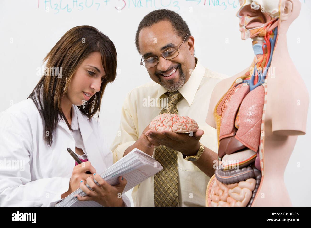 Teacher and Student in Science Lab Stock Photo - Alamy