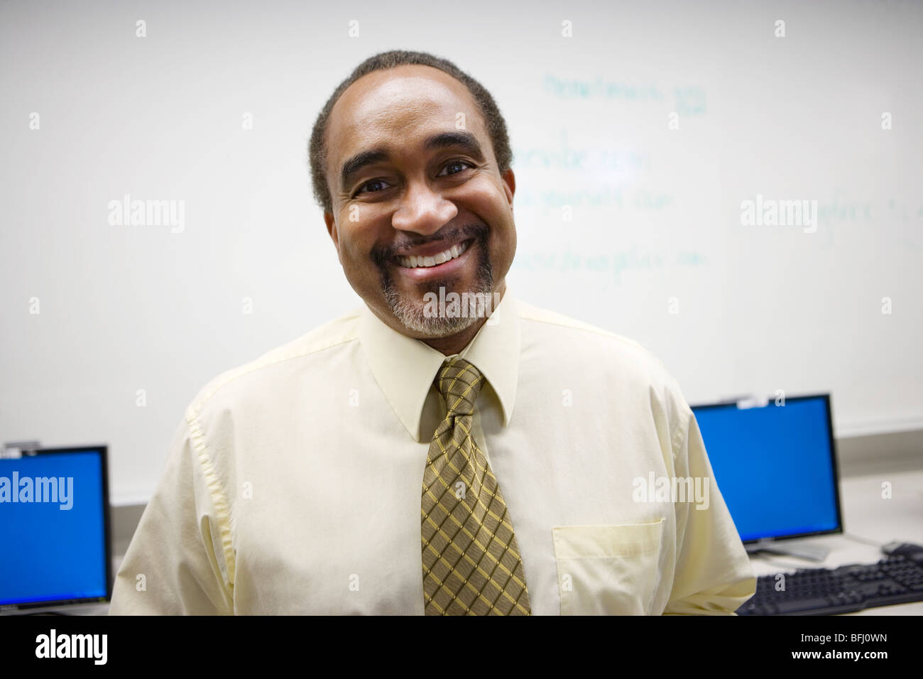 High School Teacher in Computer Lab Stock Photo - Alamy