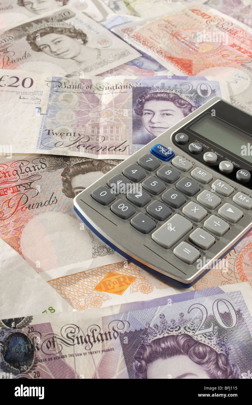 British paper currency and calculator Stock Photo - Alamy