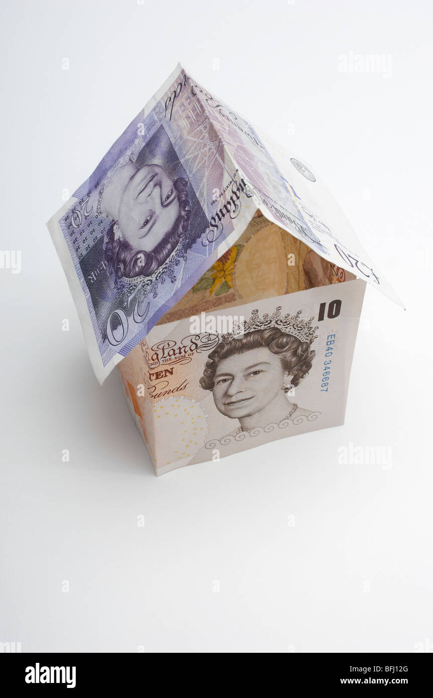 House made of paper currency Stock Photo - Alamy