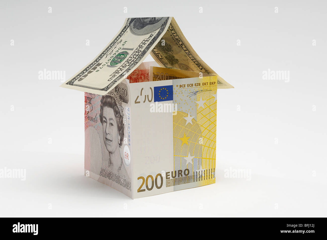House made of paper currency Stock Photo - Alamy