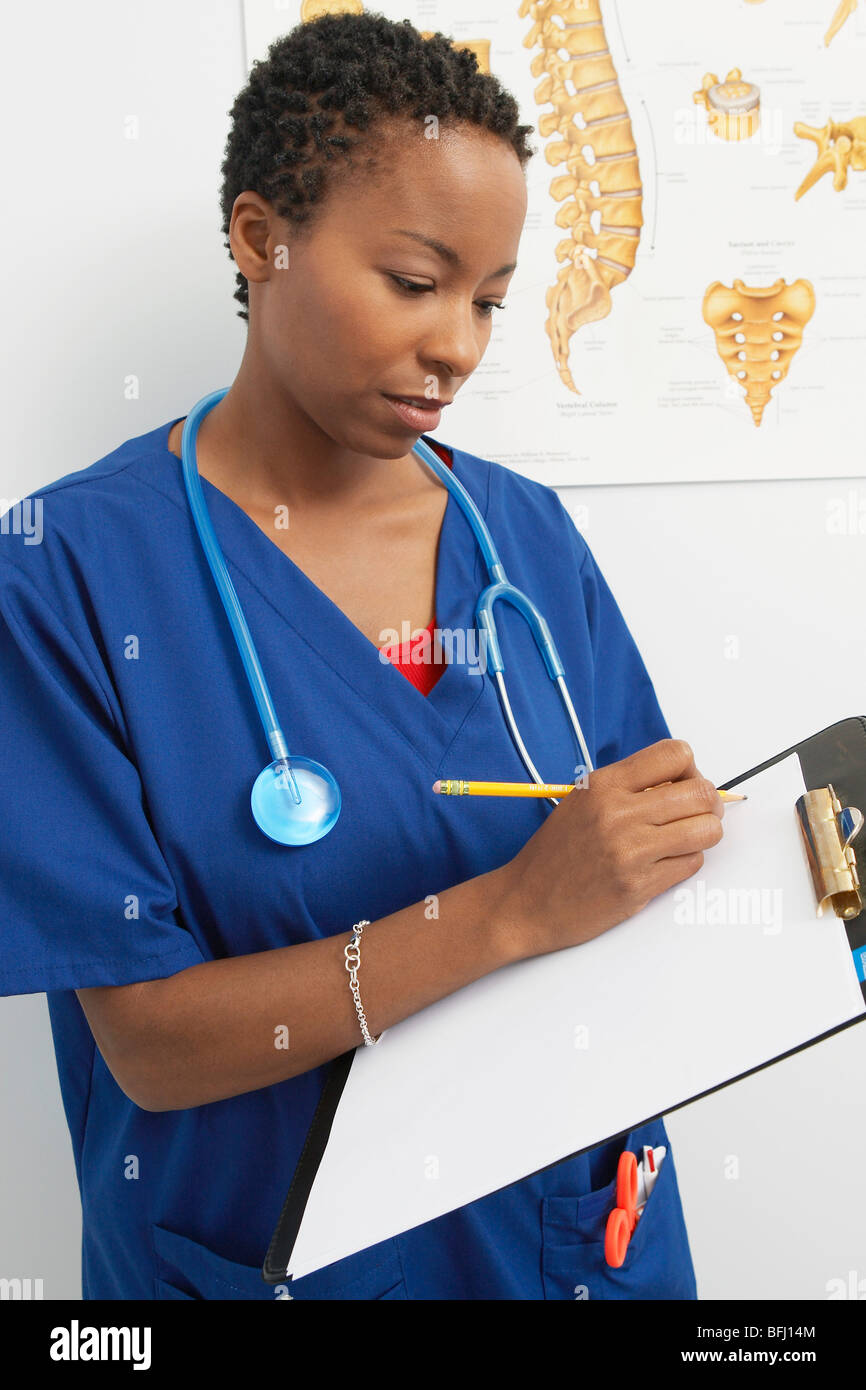 Female nurse working in hospital Stock Photo - Alamy