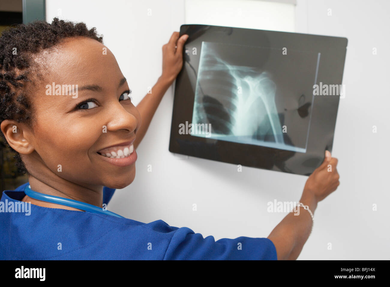 Doctor holding x-ray in hospital,portrait Stock Photo - Alamy