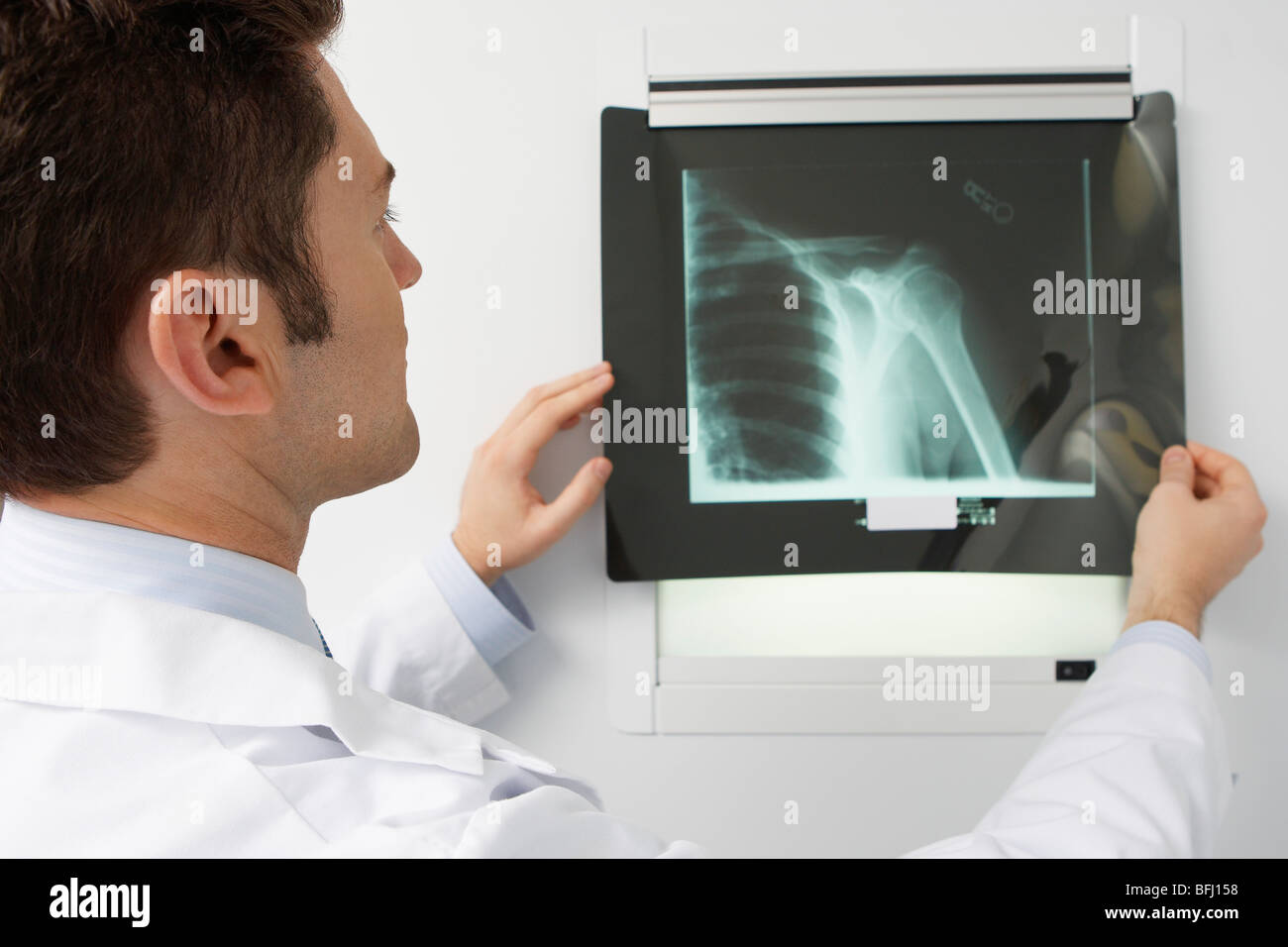 Doctor examining x-ray in hospital Stock Photo - Alamy