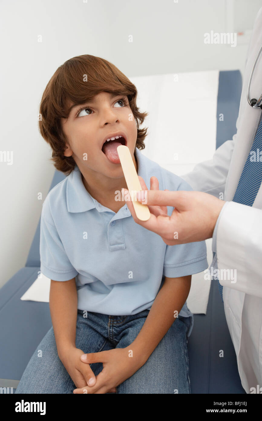 Boy having medical examination Stock Photo - Alamy