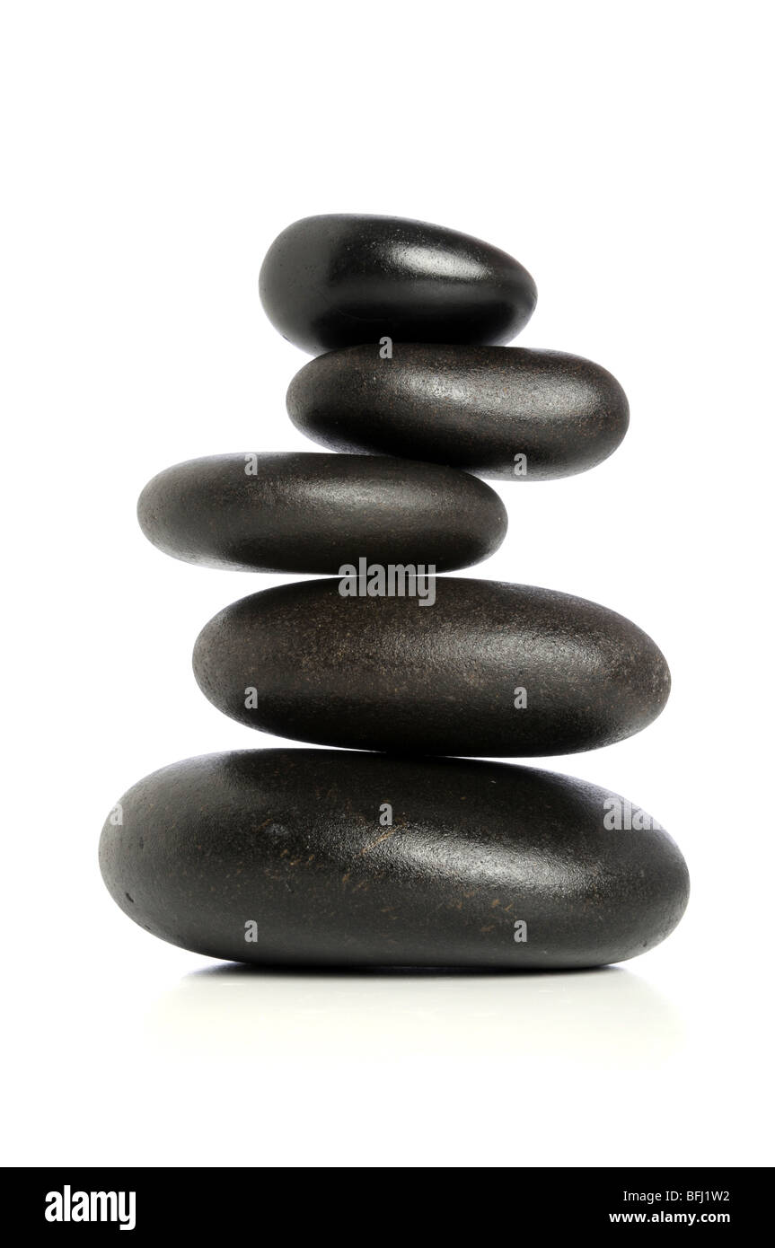 Five black stones balanced isolated over white background Stock Photo ...