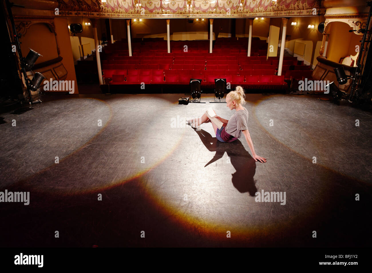 Young woman on stage Stock Photo - Alamy