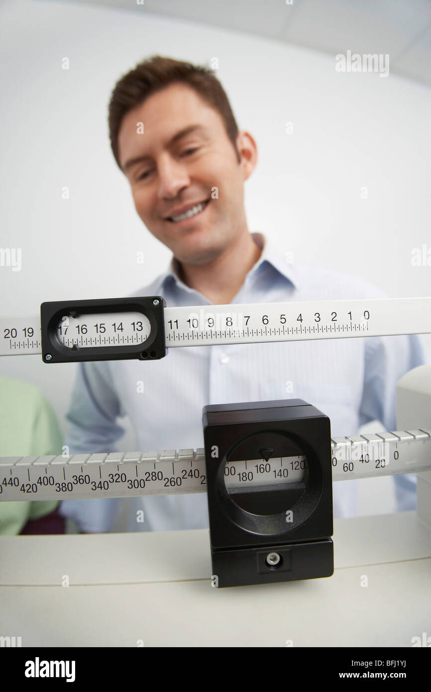 Man scales 40 hi-res stock photography and images - Alamy