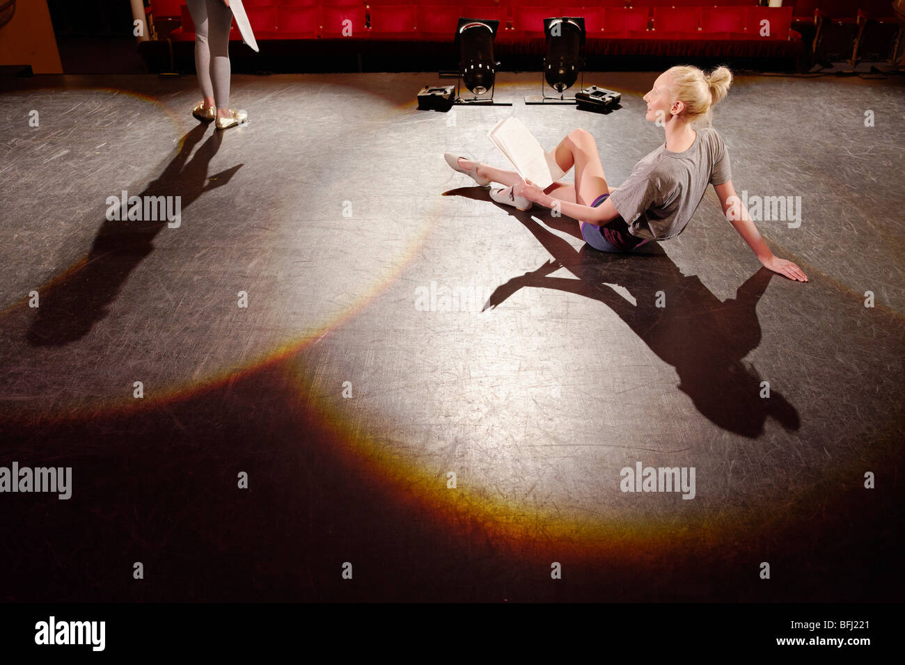 Young woman on stage Stock Photo - Alamy