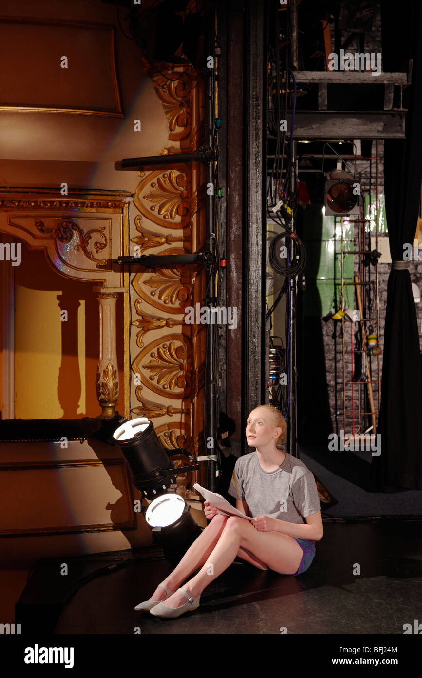 Young woman on stage Stock Photo - Alamy