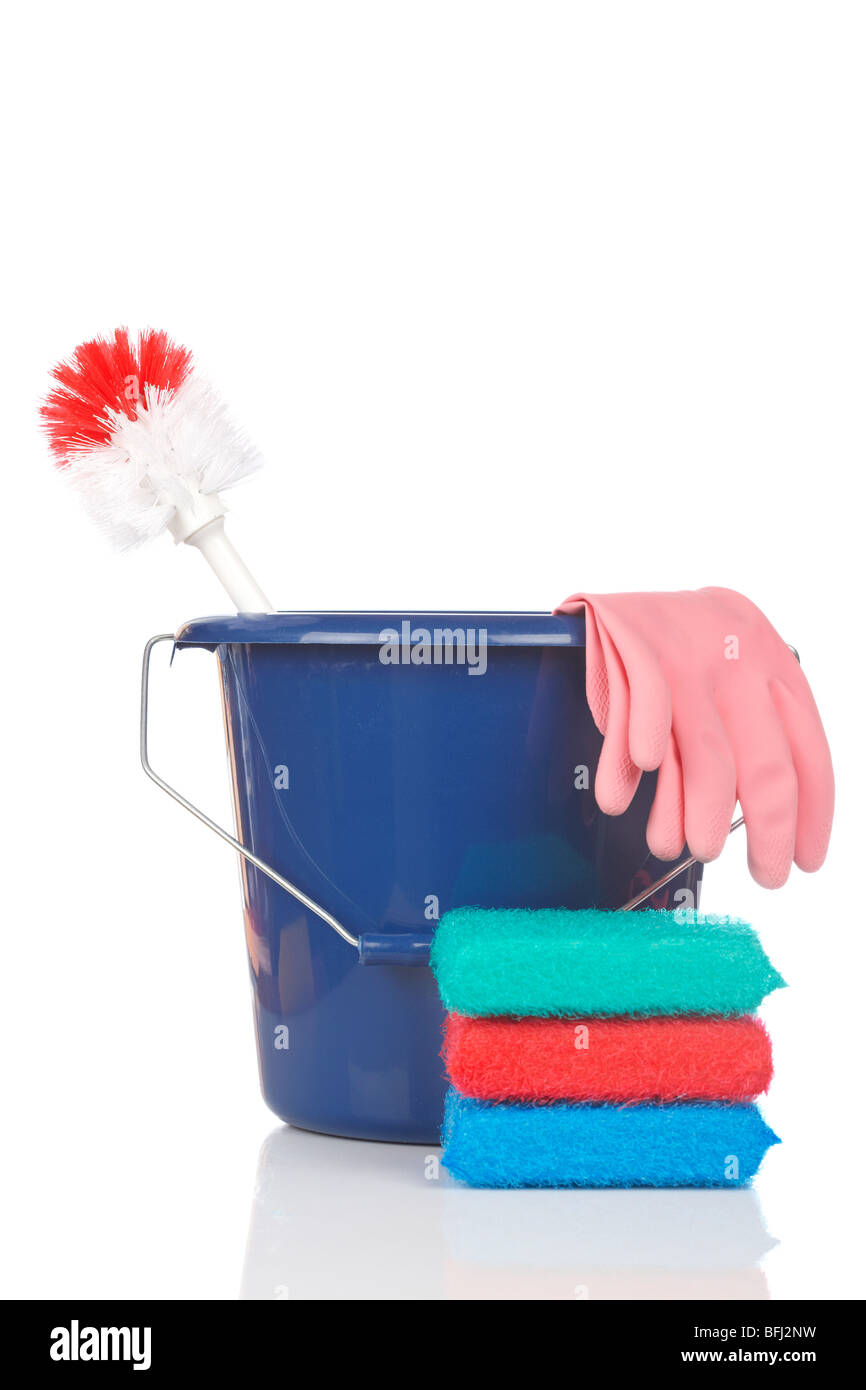 Cleaning tools in a plastic bucket over a white background. Shallow ...
