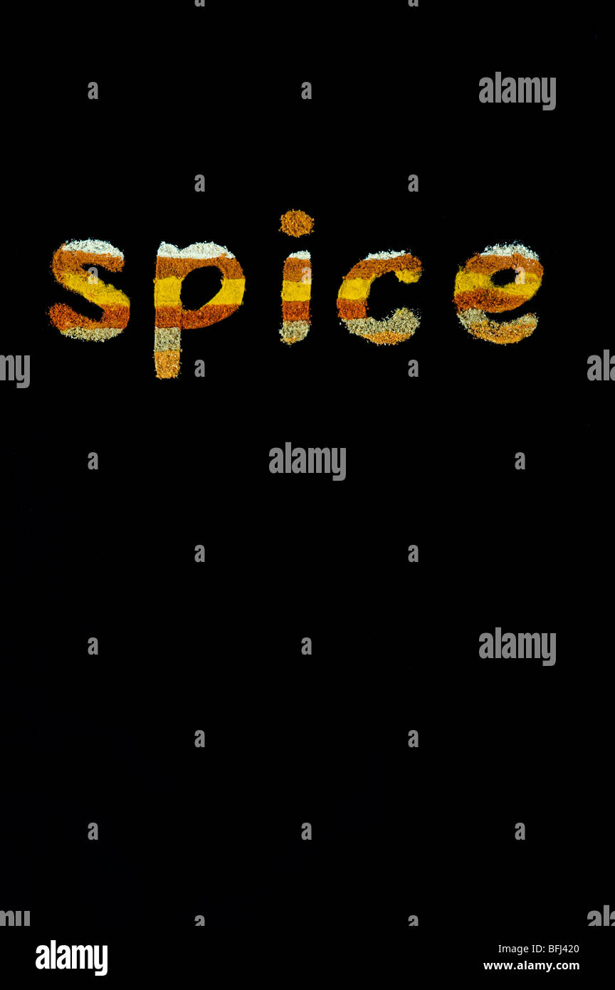 The word 'spice' written in Indian spices on black background Stock ...