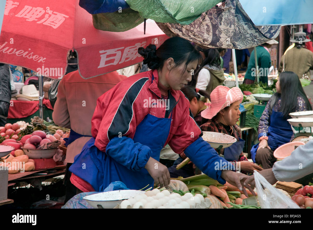 chinese woman shopkeeper at a vegetable market stall in lhasa Stock ...
