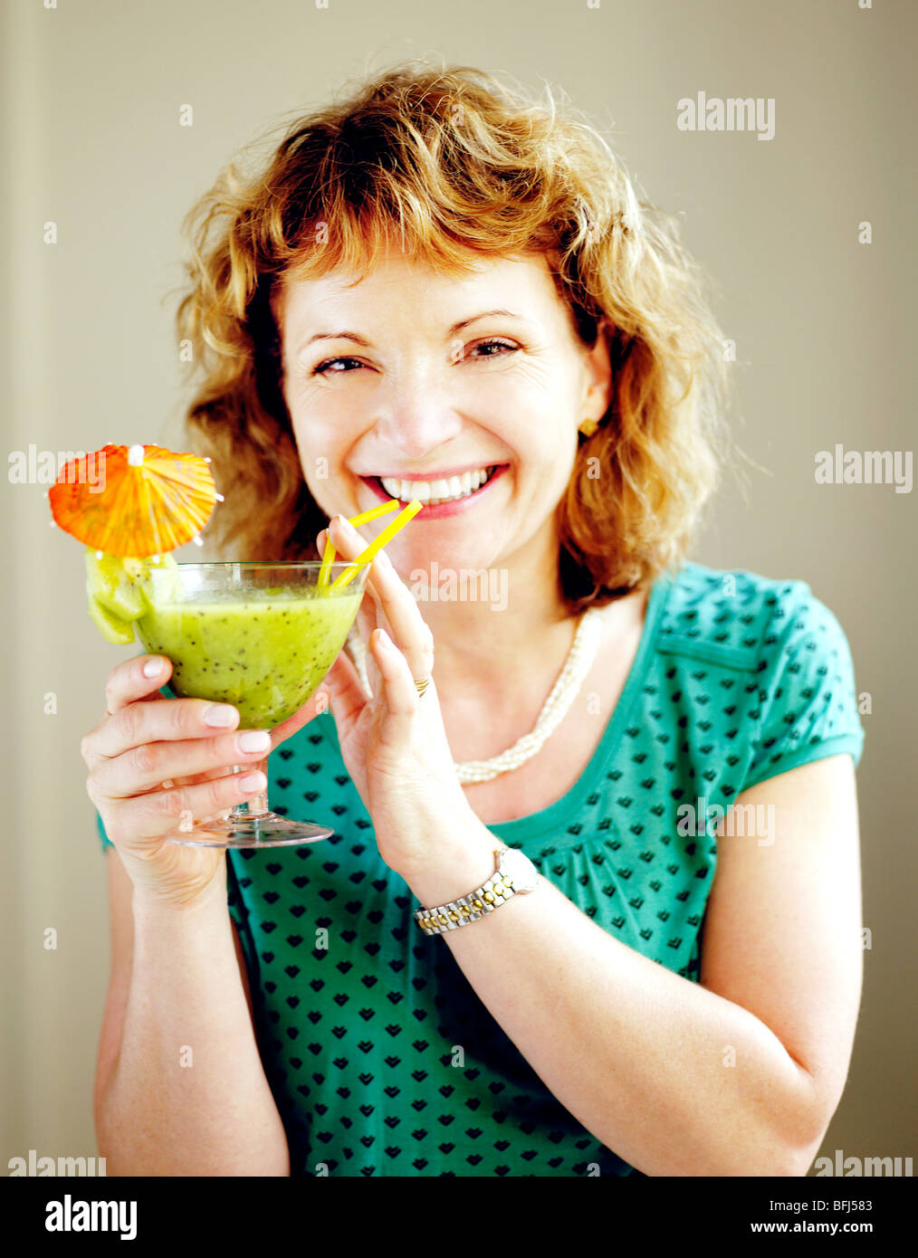 A woman with a drink, Sweden Stock Photo - Alamy