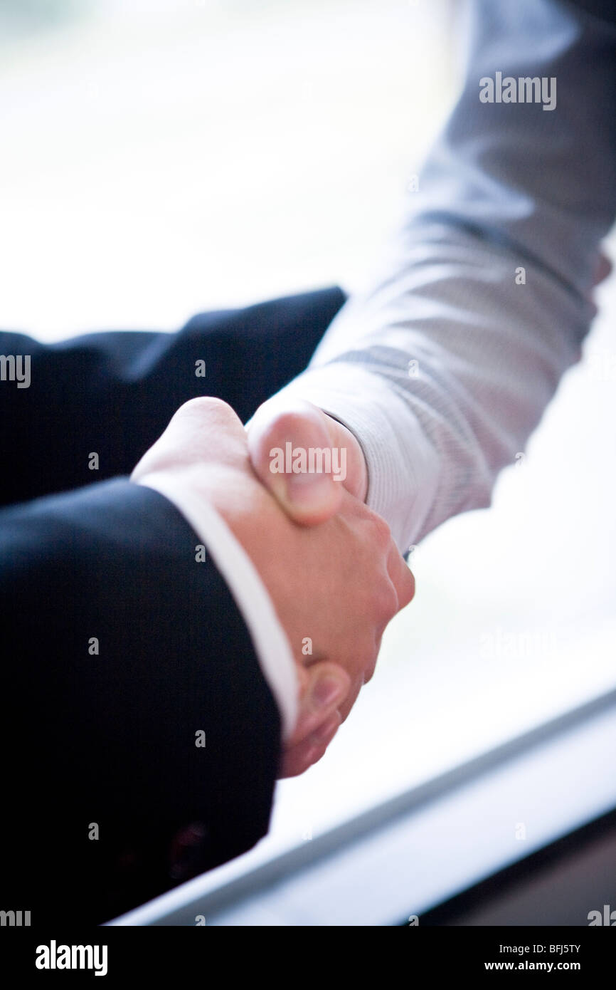 A handshake, close-up, Sweden Stock Photo - Alamy