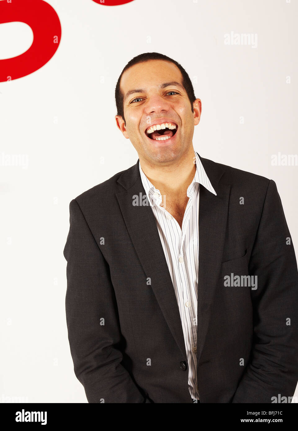 Portrait of a laughing man in a suit, Sweden Stock Photo - Alamy