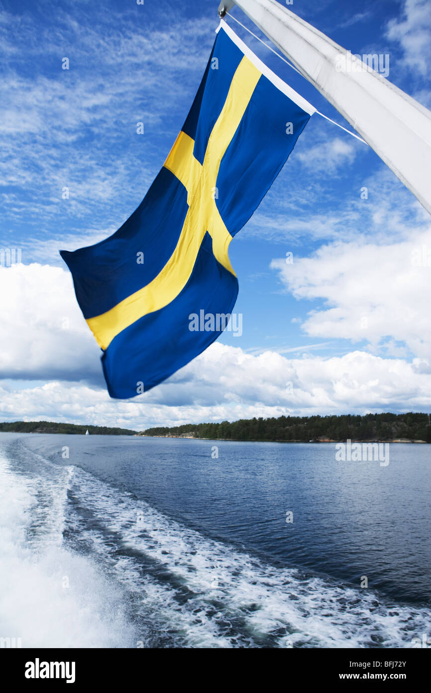 Swedish flag on a boat, Sweden Stock Photo - Alamy