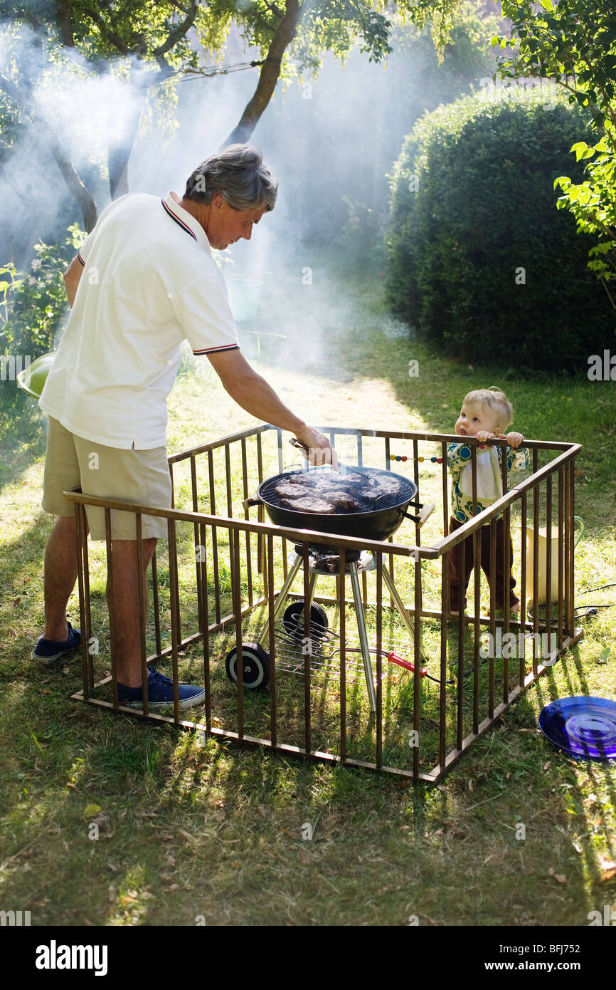 A man barbecuing, Sweden Stock Photo - Alamy