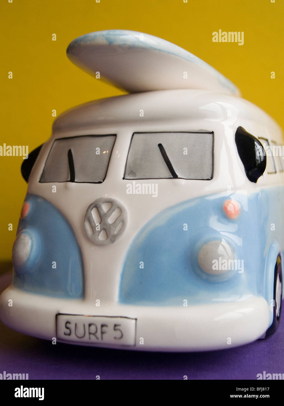 A ceramic Volkswagen Campervan with a surfboard on the roof Stock Photo ...