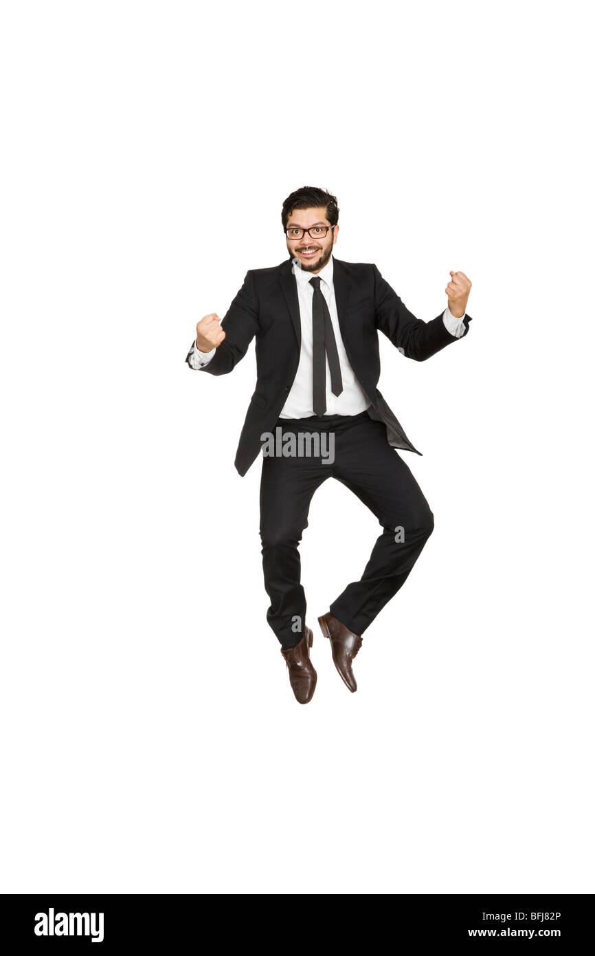 Businessman jumping of joy Stock Photo - Alamy