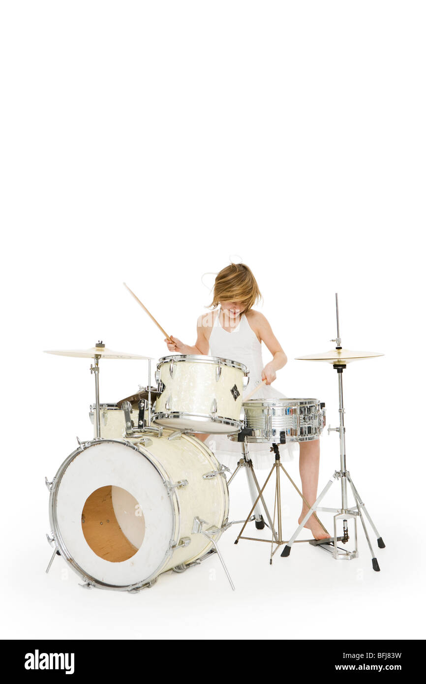 Girl playing the drum Cut Out Stock Images & Pictures - Alamy