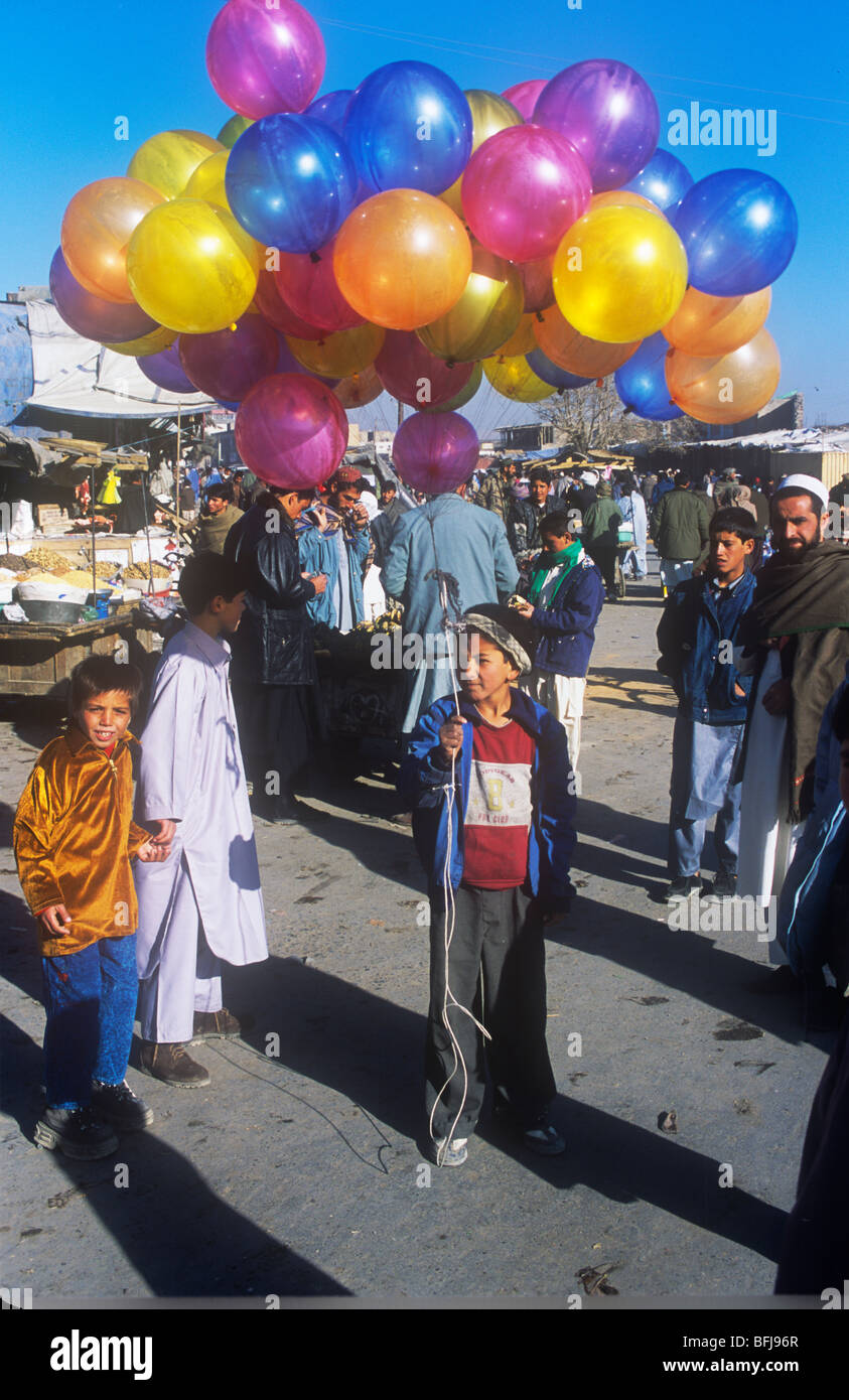 Boy selling balloons in Kabul Stock Photo - Alamy