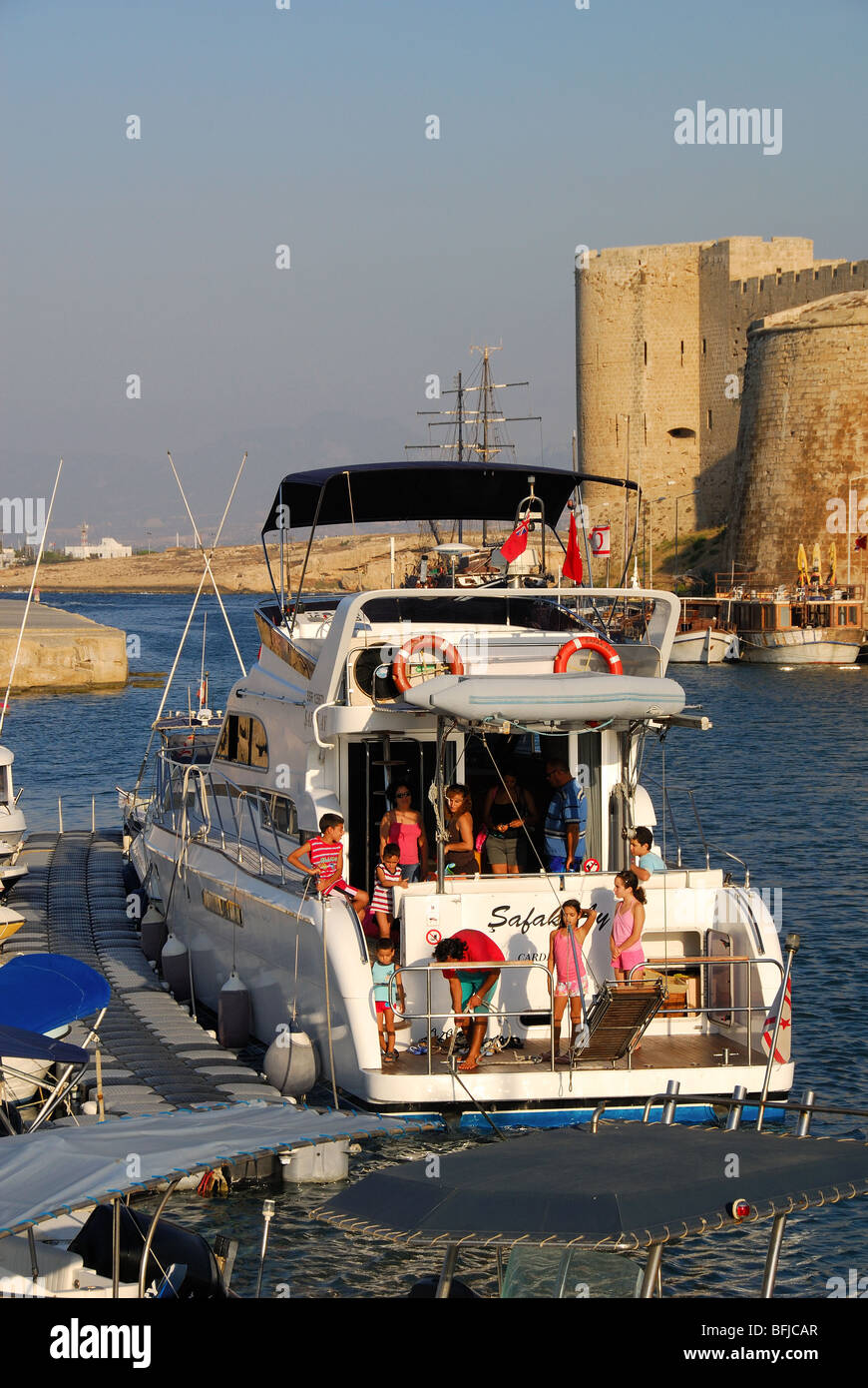 NORTH CYPRUS. A family on a boat in Kyrenia harbour. 2009 Stock Photo ...