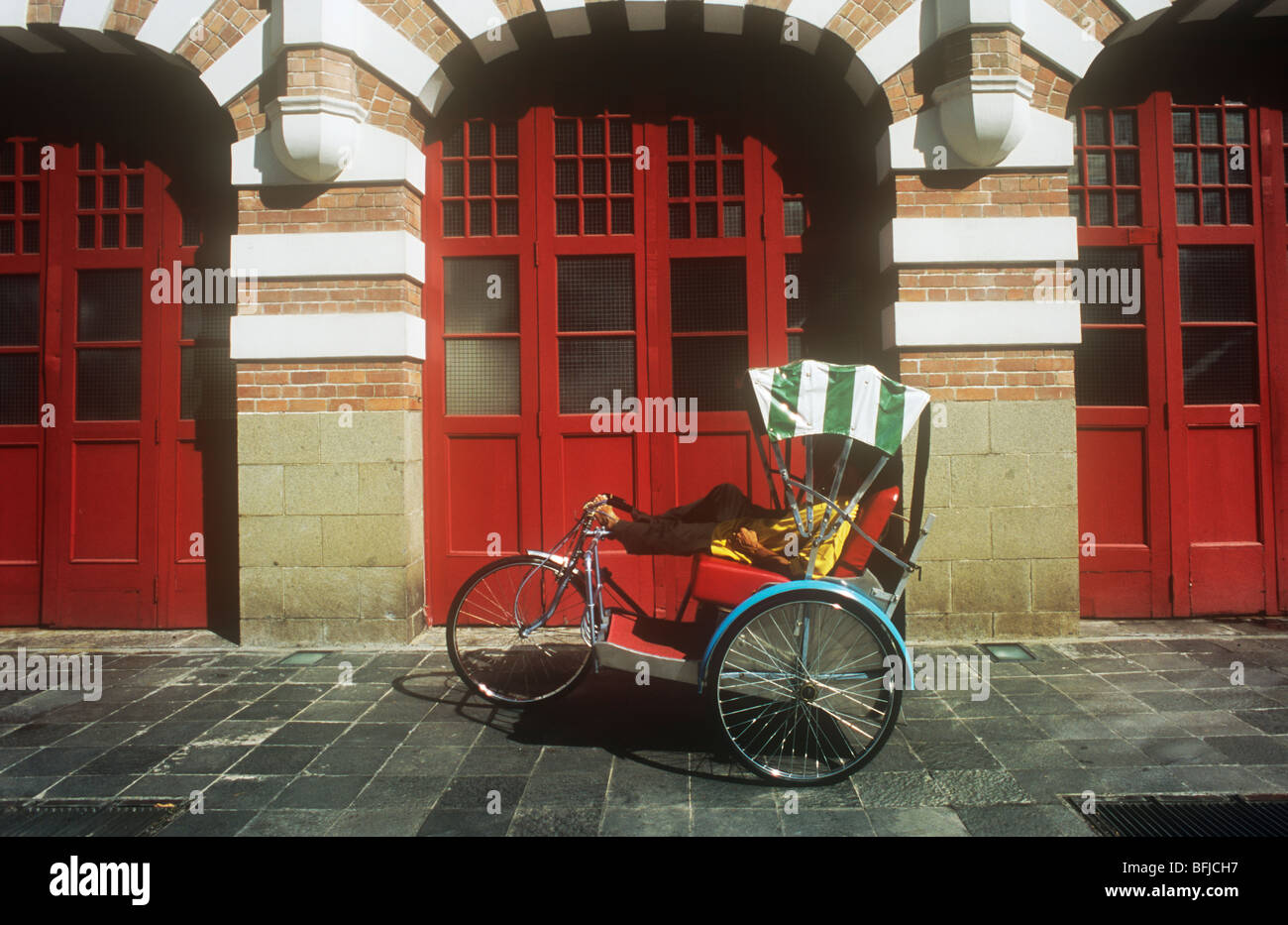 Rickshaw driver, Singapore Stock Photo - Alamy