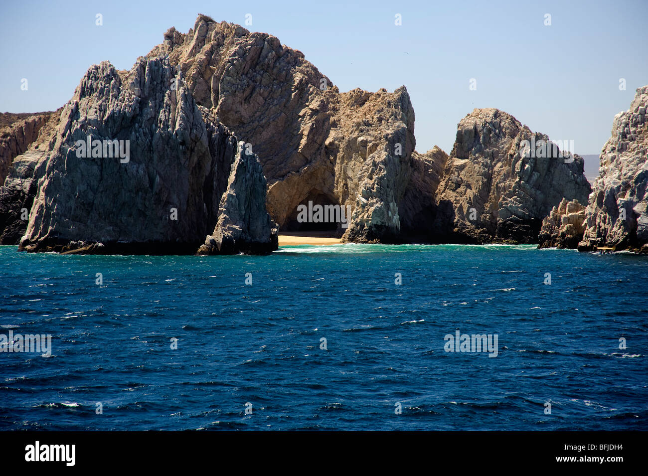 Cabo San Lucas, Mexico shoreline with cave showing in the rocks. The ...