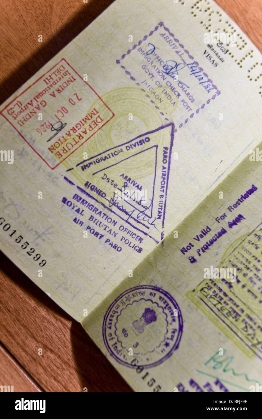 International immigration stamps and visas in a passport Stock Photo ...