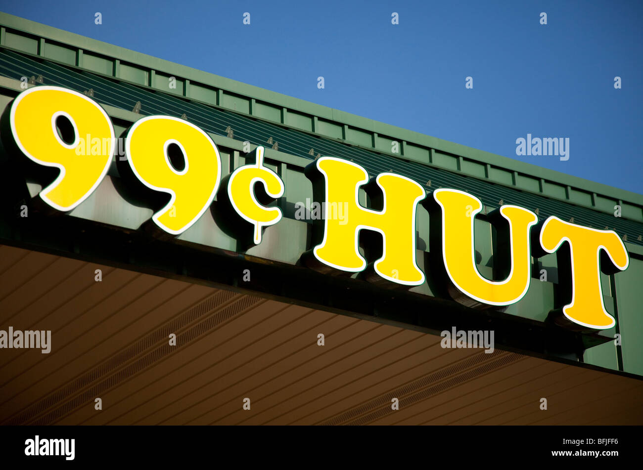 Sign on top of a store Stock Photo - Alamy