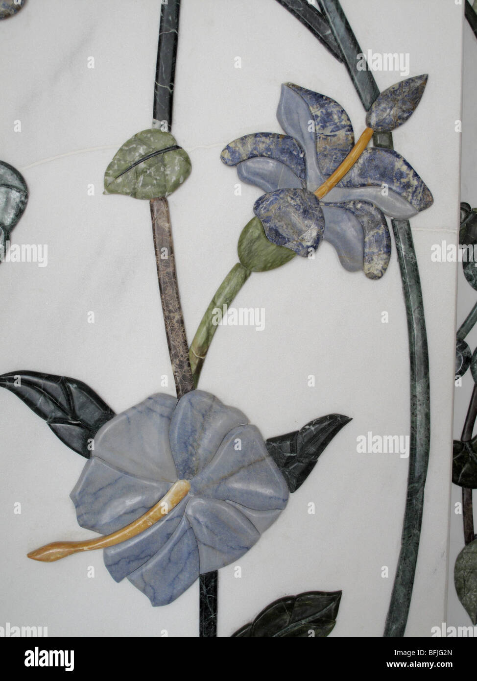White marble column inlaid with flowers of coloured marble at Sheikh ...
