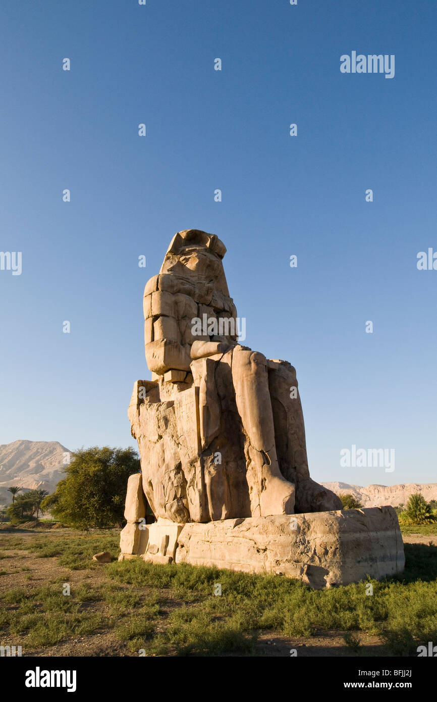 The Colossi of Memnon, guardians to the Memorial Temple of Amenhotep ...