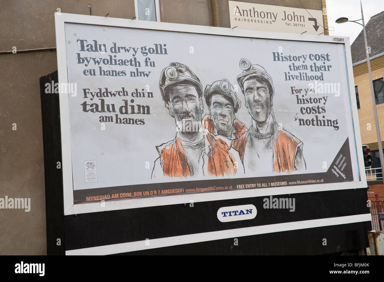 Titan bilingual Welsh English language billboard showing coal miners ...