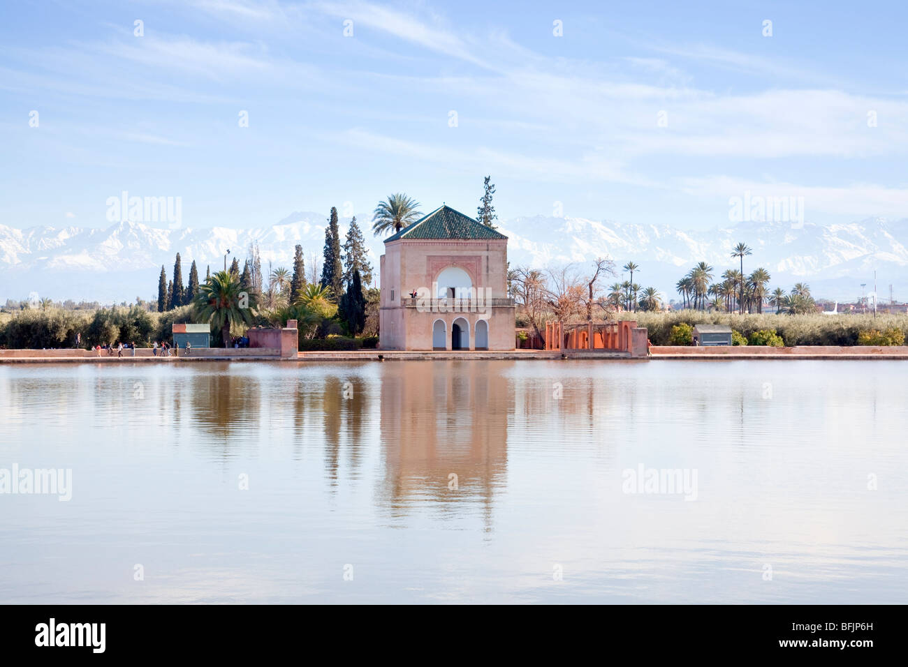 The Pavilion of the Menara with distant Atlas Mountains, Marrakesh ...