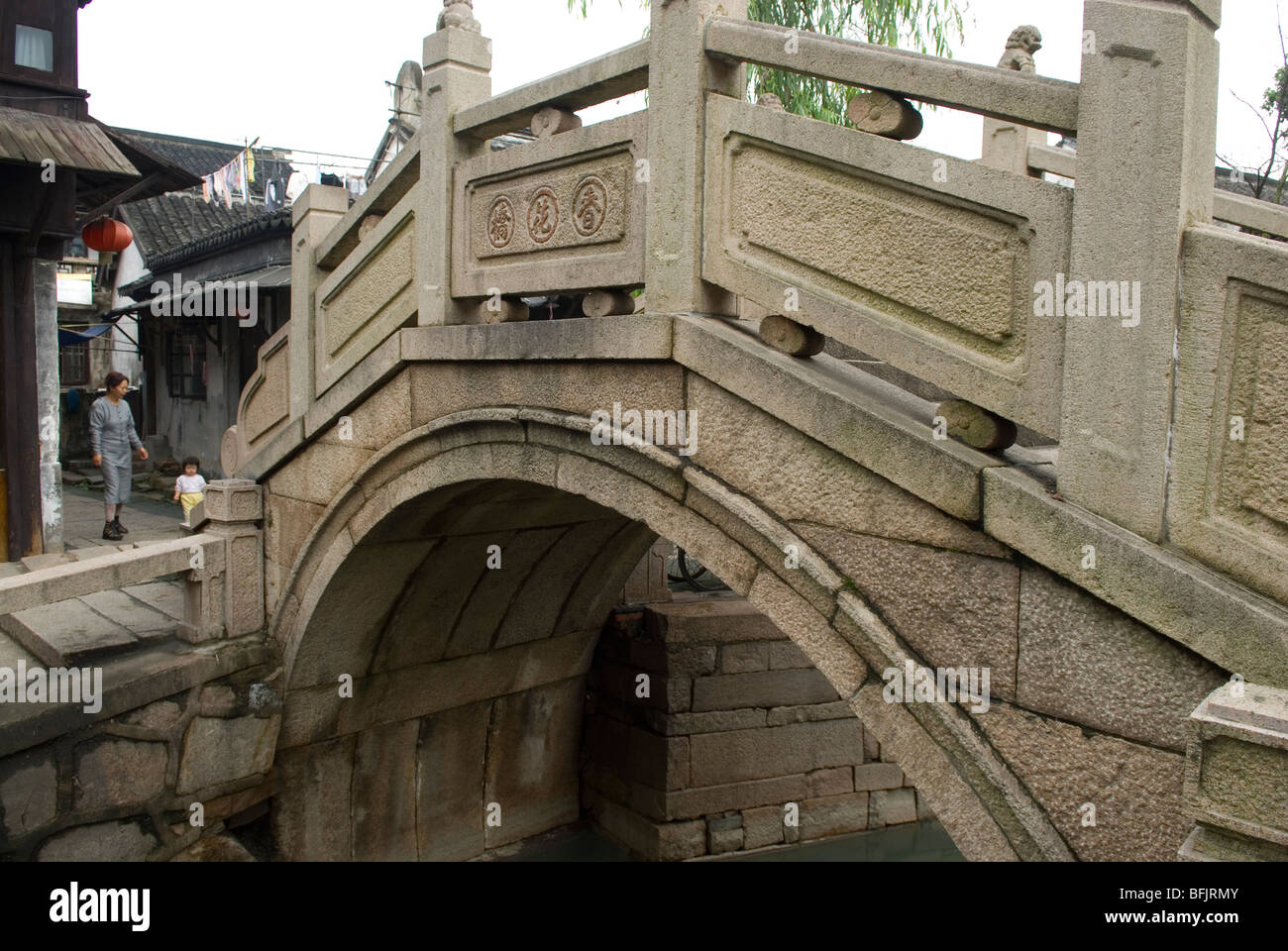 One of the arched bridges in the small ancient town of Luzhi, Jiangsu ...