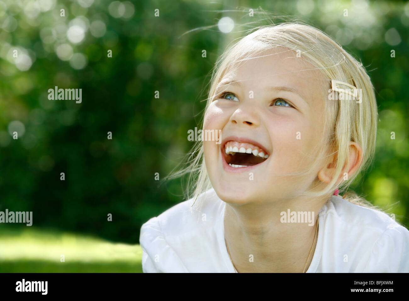 A Scandinavian girl smiling in the sun, Sweden Stock Photo - Alamy