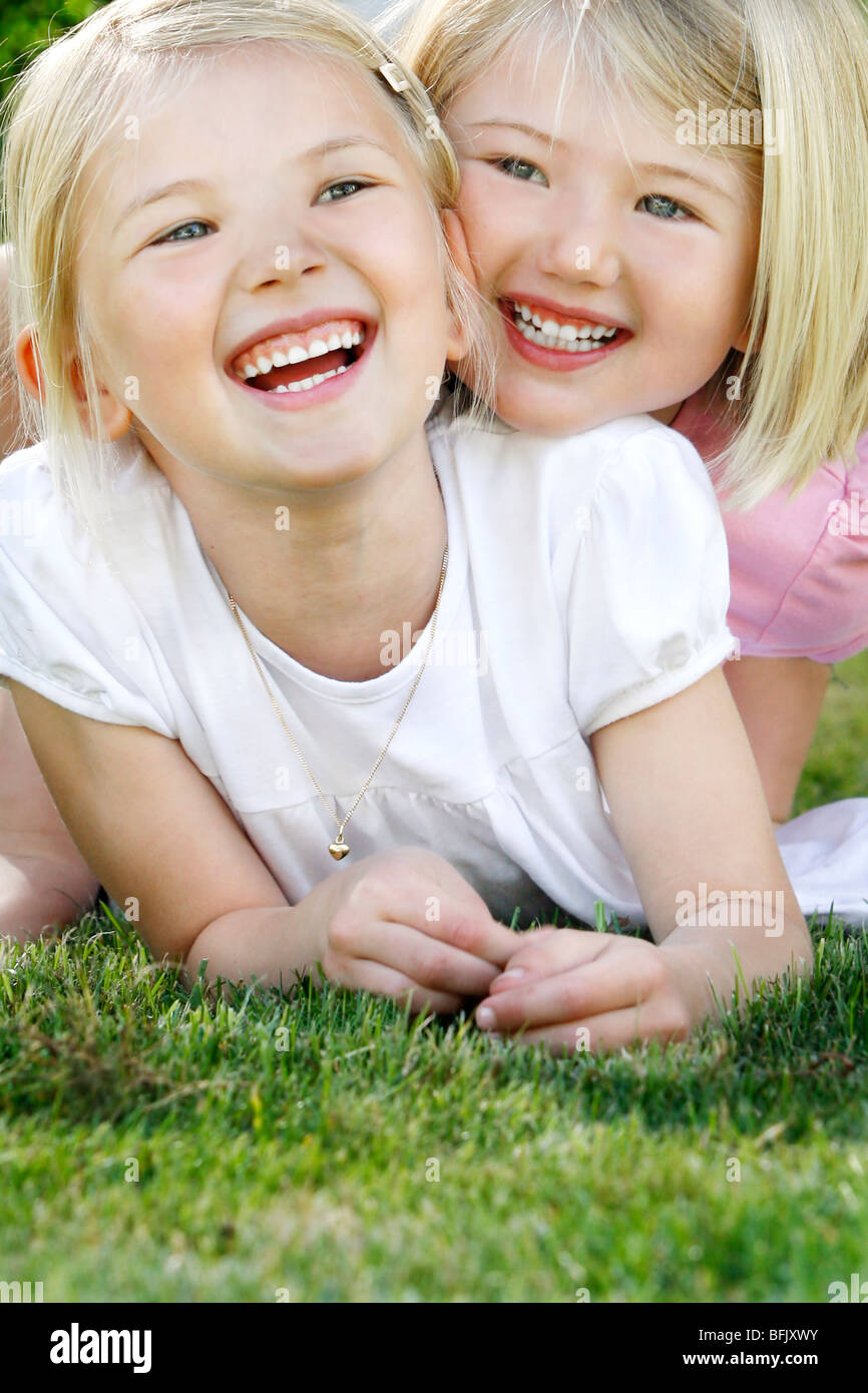 Two Scandinavian girls laughing Stock Photo - Alamy