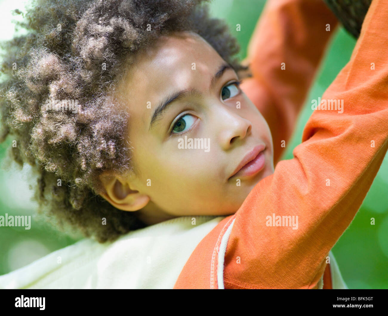 Close up of mixed race boy playing Stock Photo - Alamy