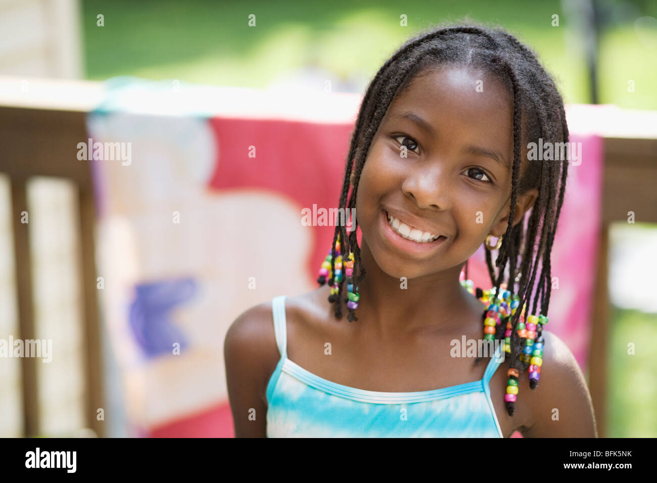 Close up of African girl smiling Stock Photo - Alamy